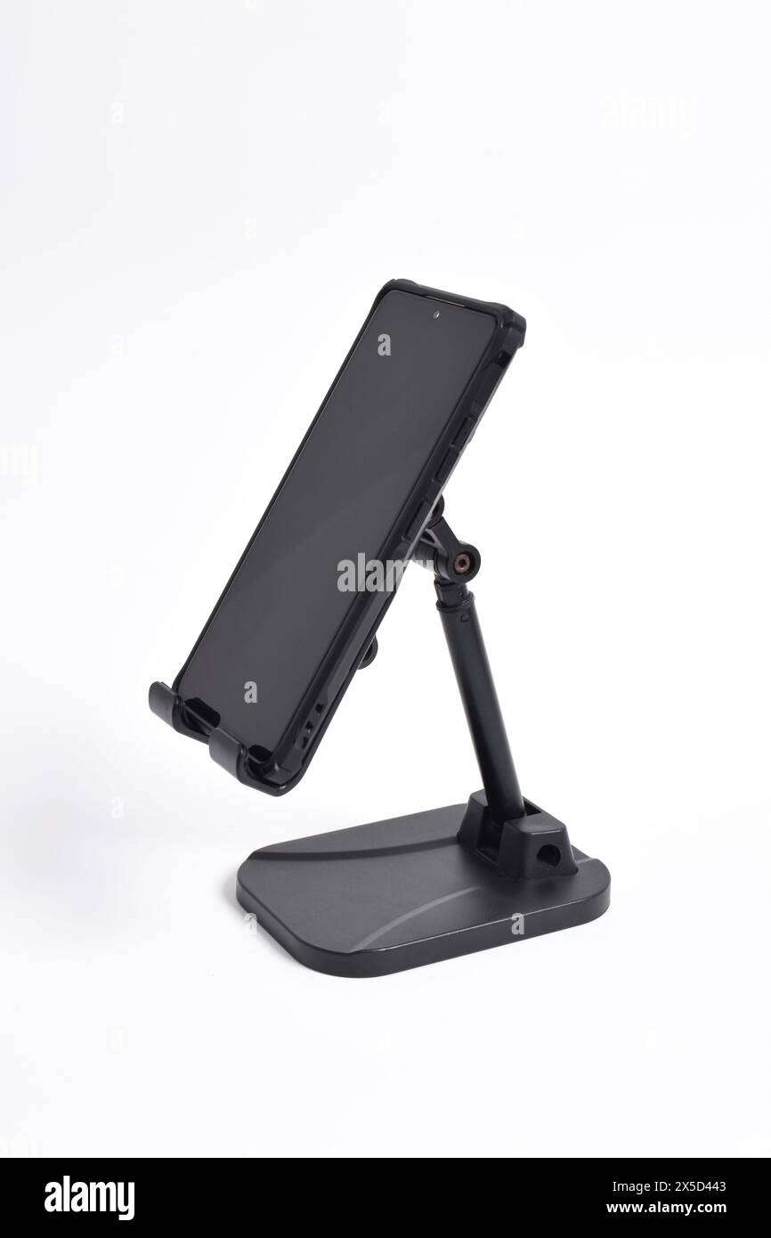 Phone holder stand that can be adjusted to height angle isolated on ...