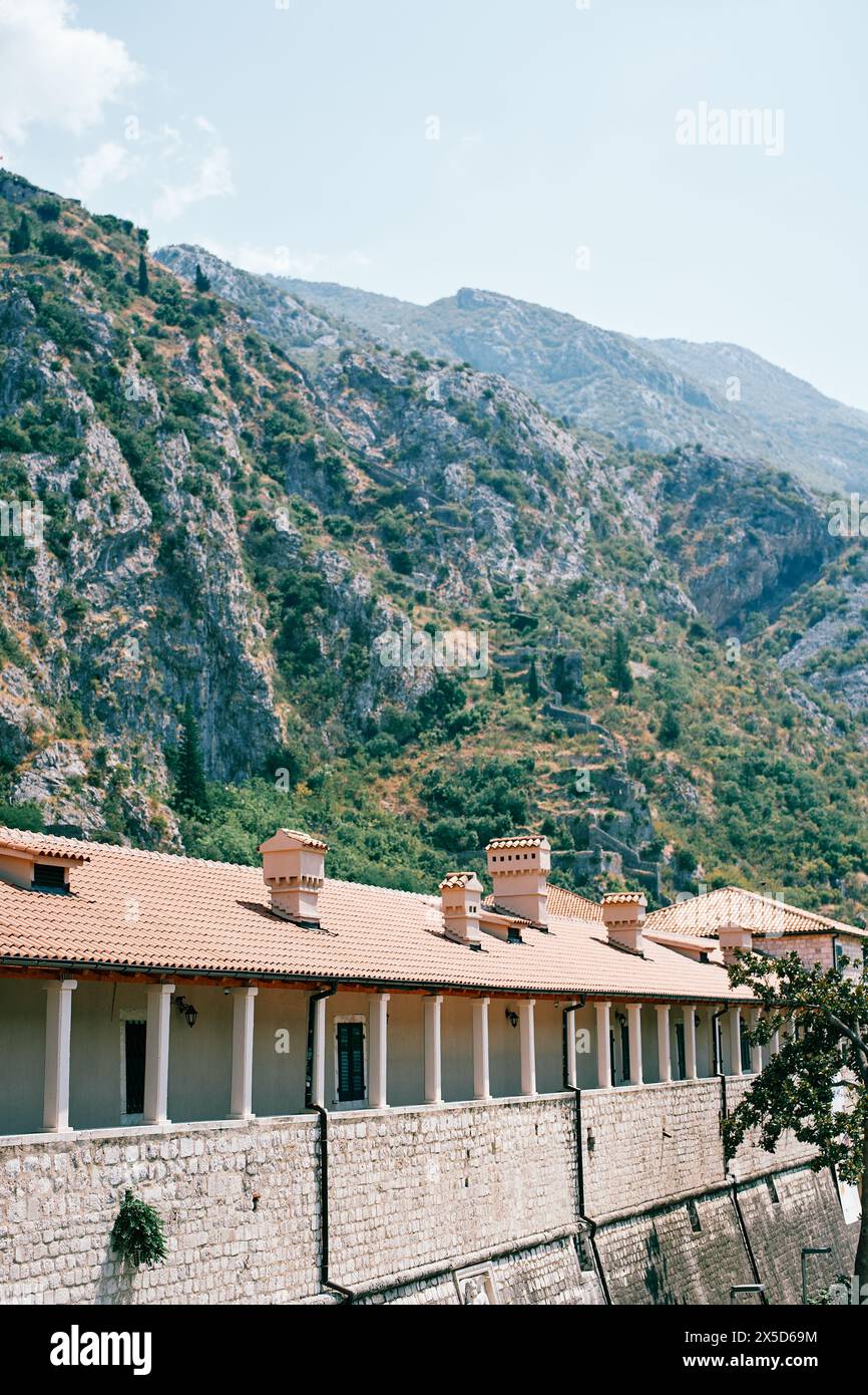 Old stone citadel building with a long arcade. Kotor, Montenegro Stock ...