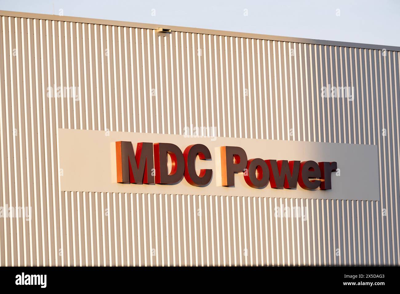 company logo MDC Power GmbH on facade building, German automotive ...