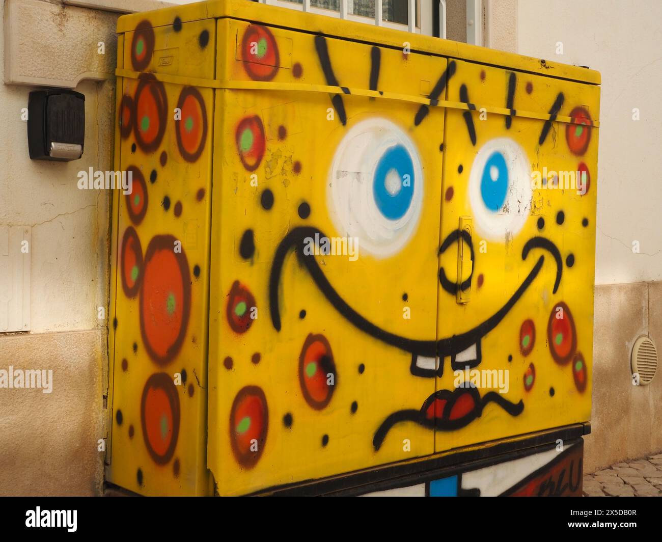 Bright yellow electricity supply maintenance box in rua Carlos da Maia ...