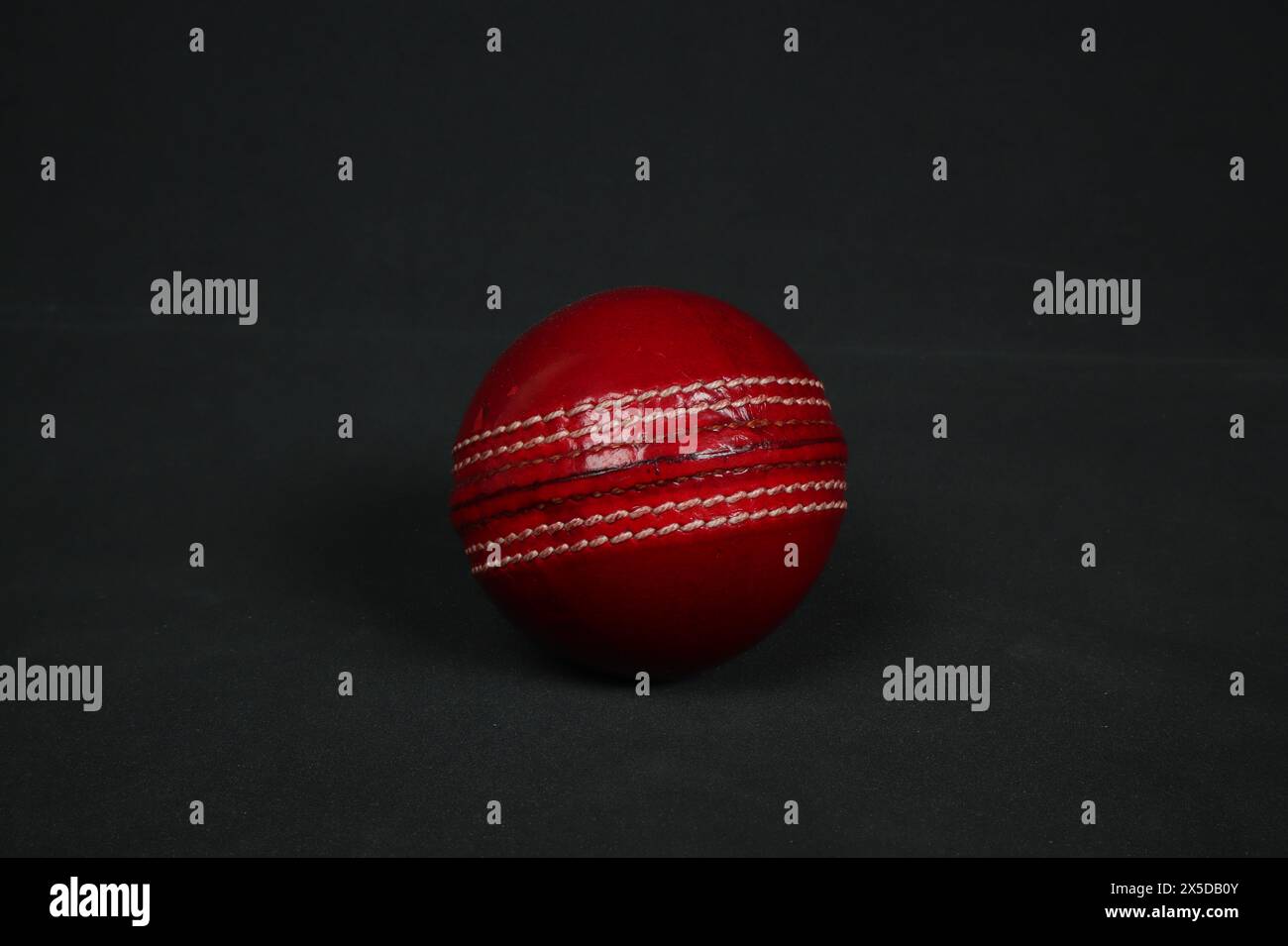Red cricket ball hi-res stock photography and images - Alamy
