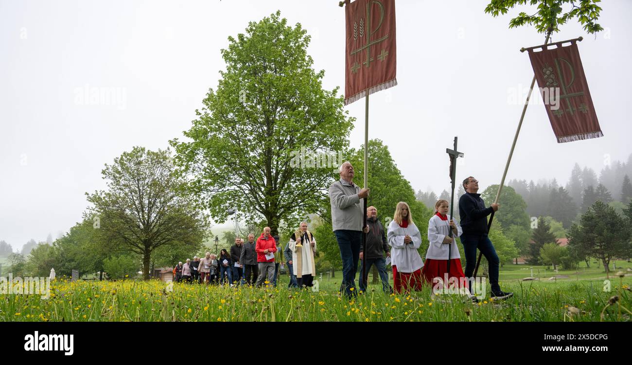 09 May 2024, Bavaria, Roßhaupten: The faithful parade around the ...
