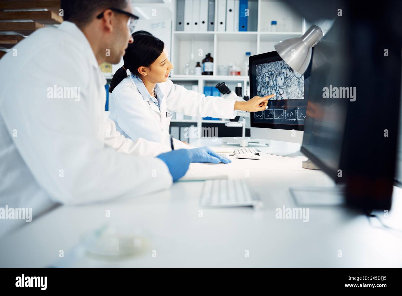 Science, medical and people in lab, computer and research with screen ...