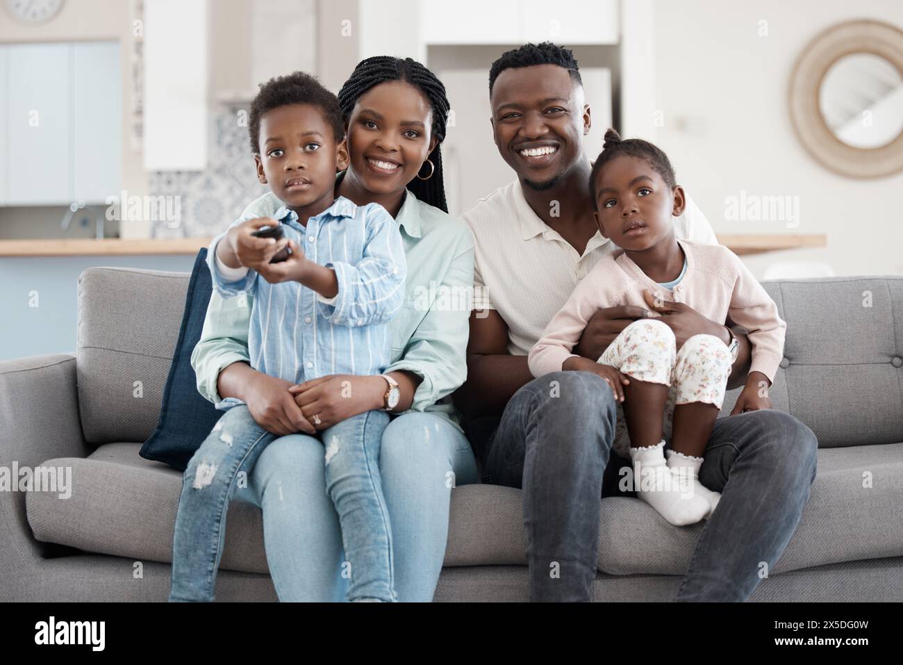 Home, portrait and black family watching tv, smile and happiness with weekend break, comedy and ...