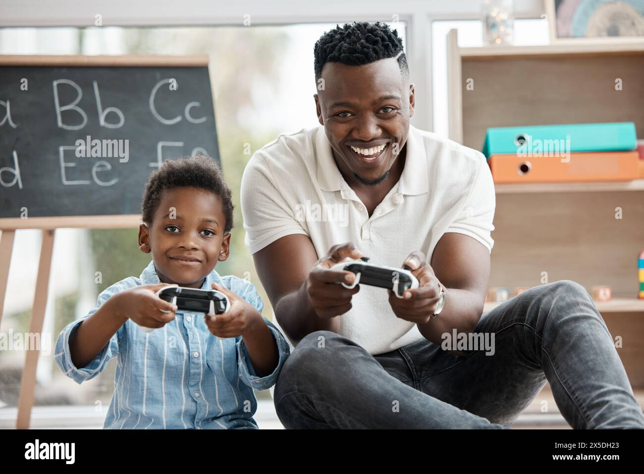 Teacher, boy and happy with video games on portrait for education ...