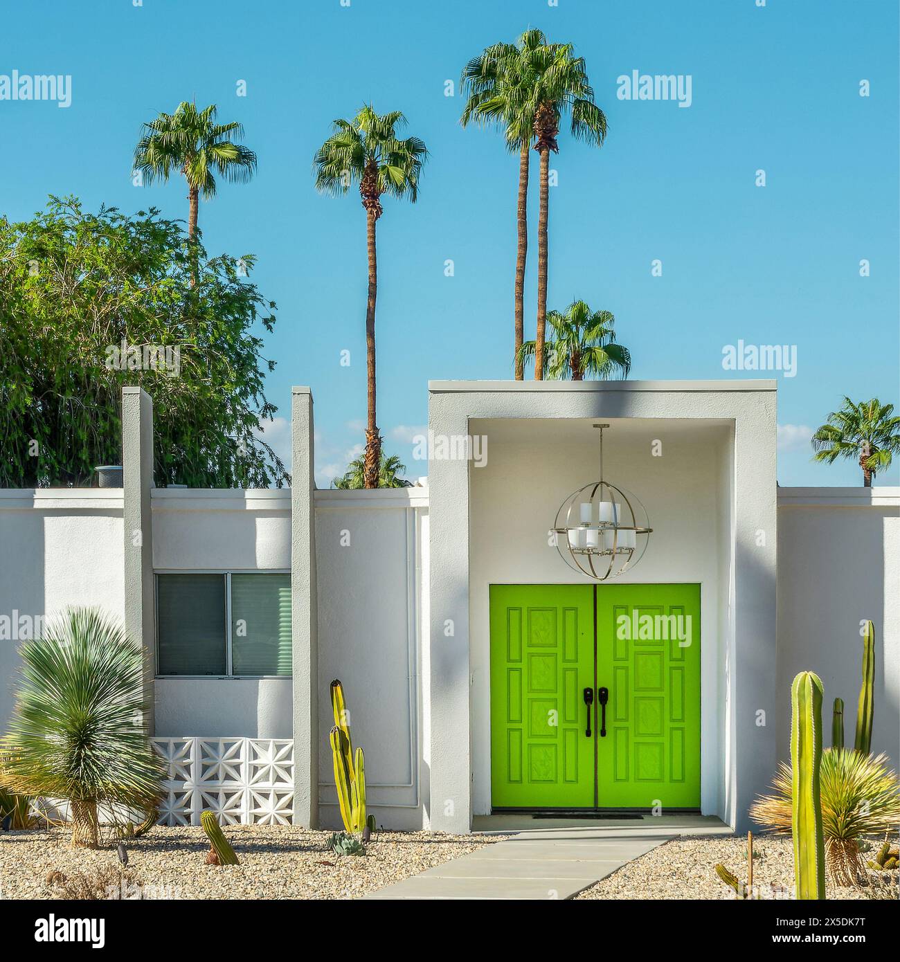 Modern mid-century architecture house with a colorful door in Palm ...