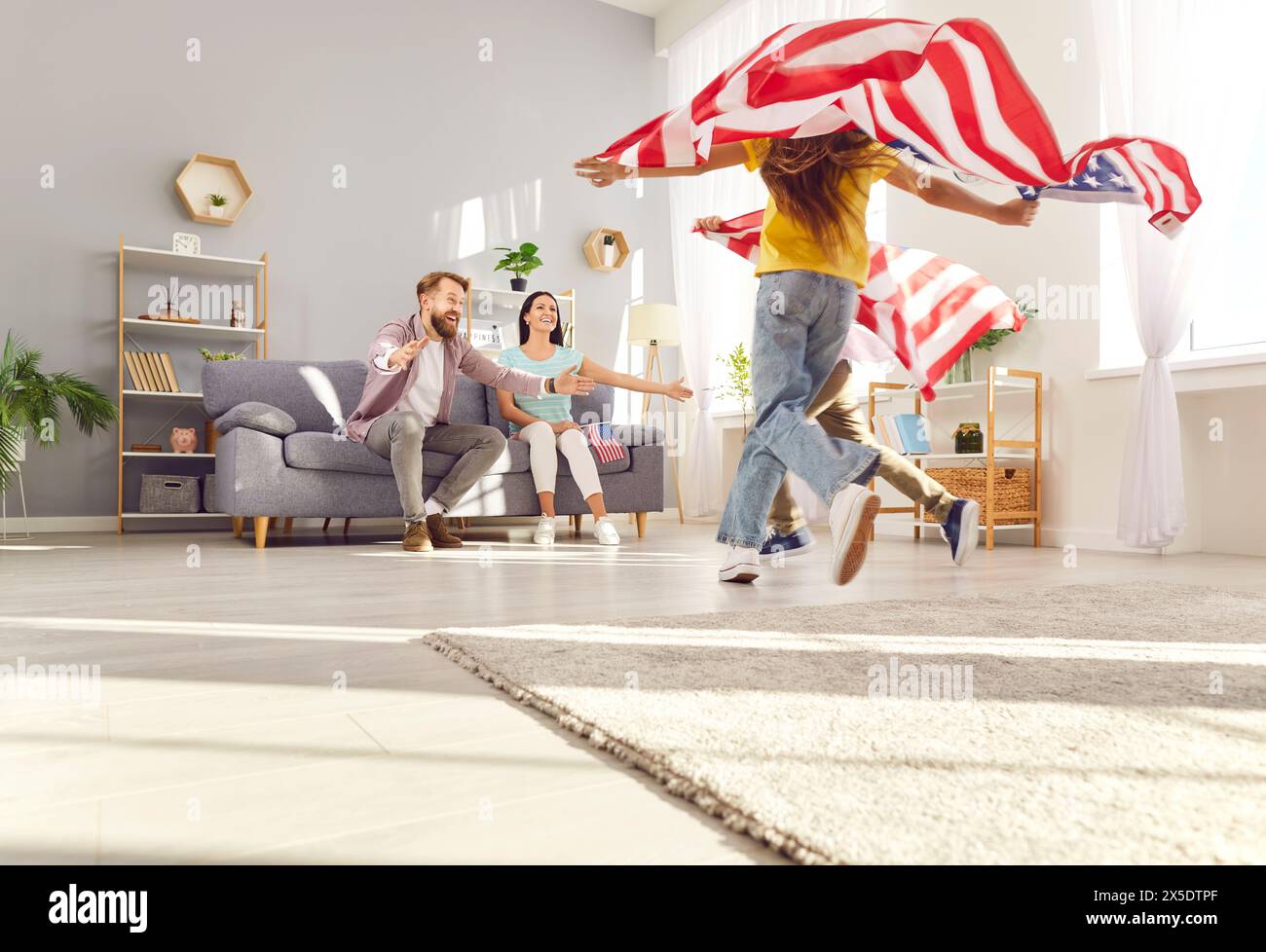Happy funny children running with flags of united states celebrating ...
