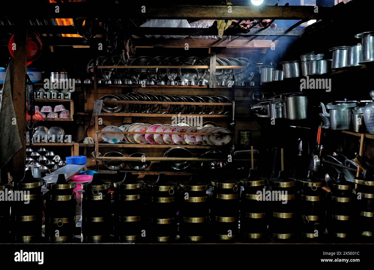Traditional teahouse kitchen with tongba millet alcohol vessels on the ...