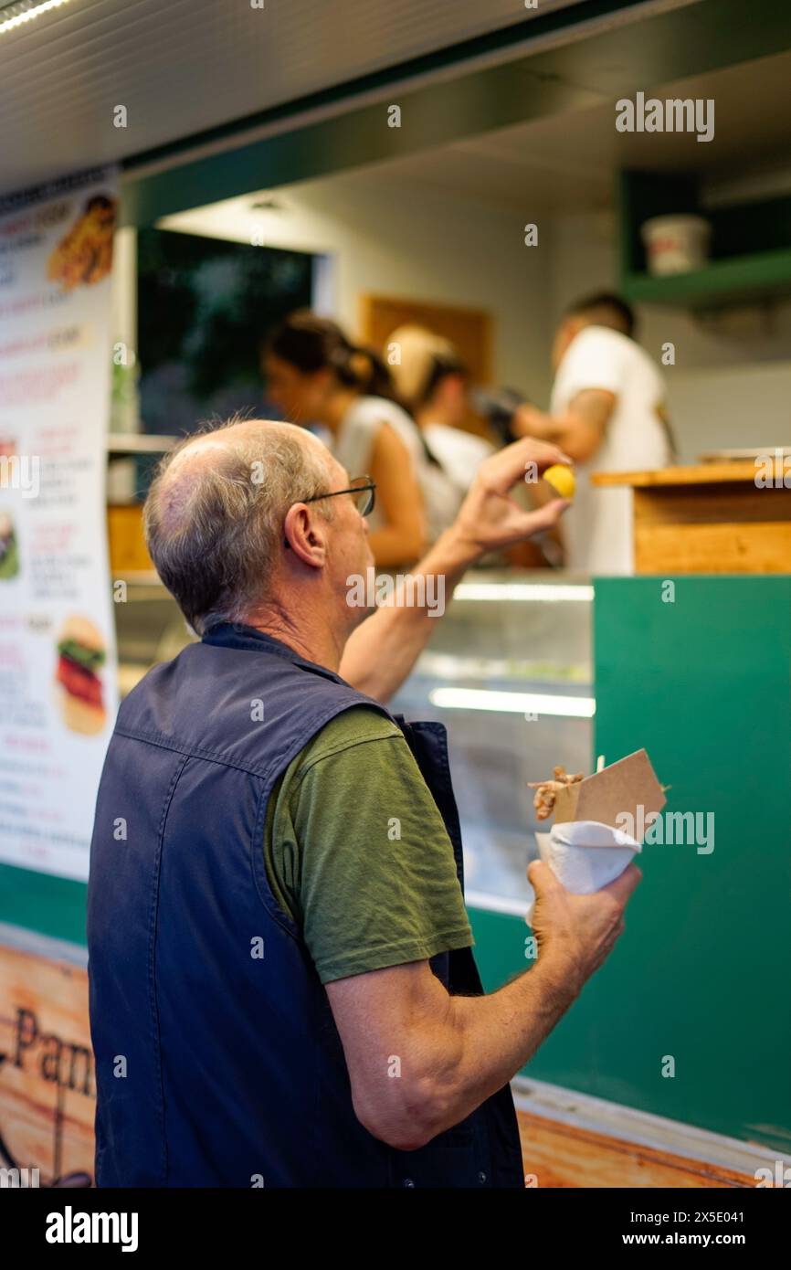 Food festival in Mele, Liguria, Italy. Food truck with sea food Stock ...