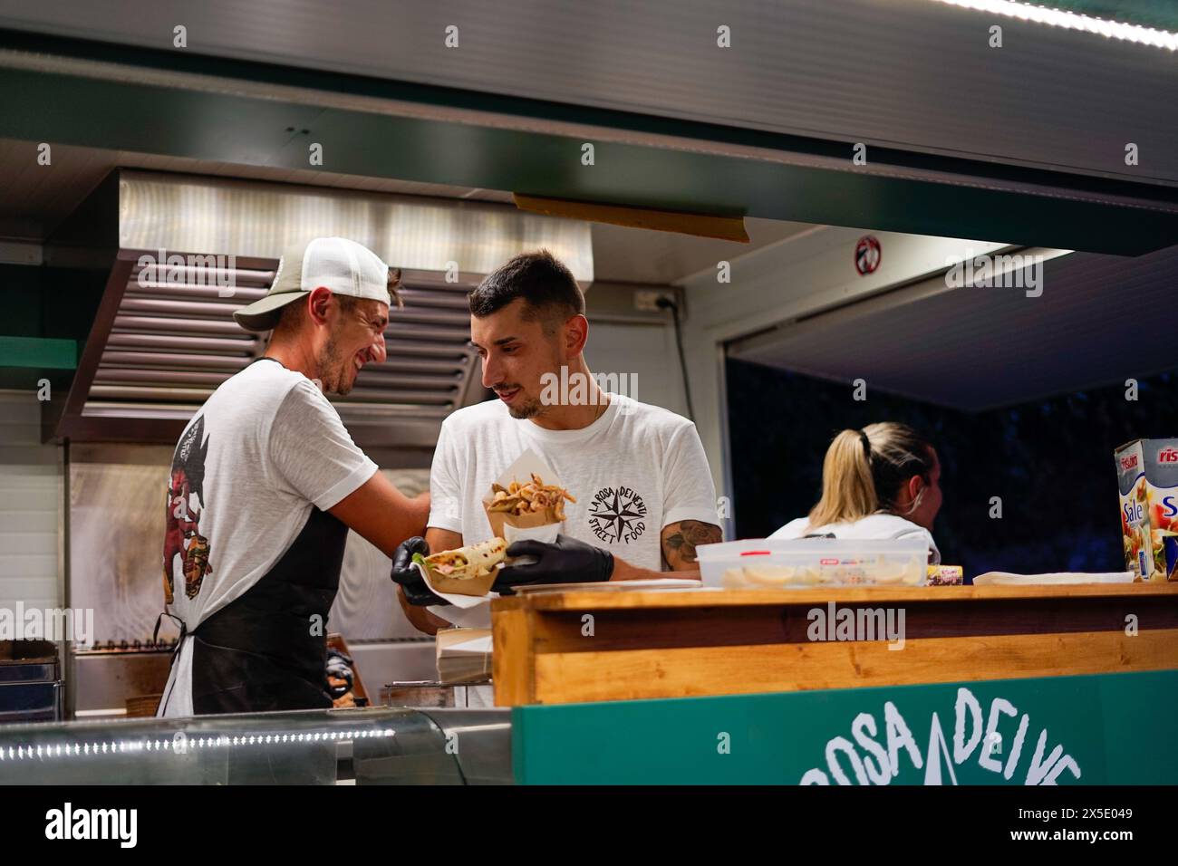 Food festival in Mele, Liguria, Italy. Food truck with sea food Stock ...