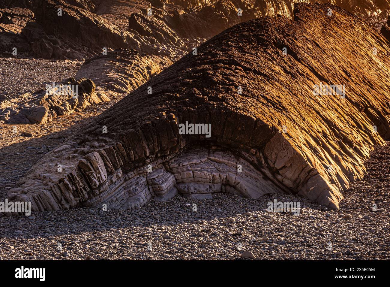 Evening light over the iconic geological formation known as Whale Rock ...