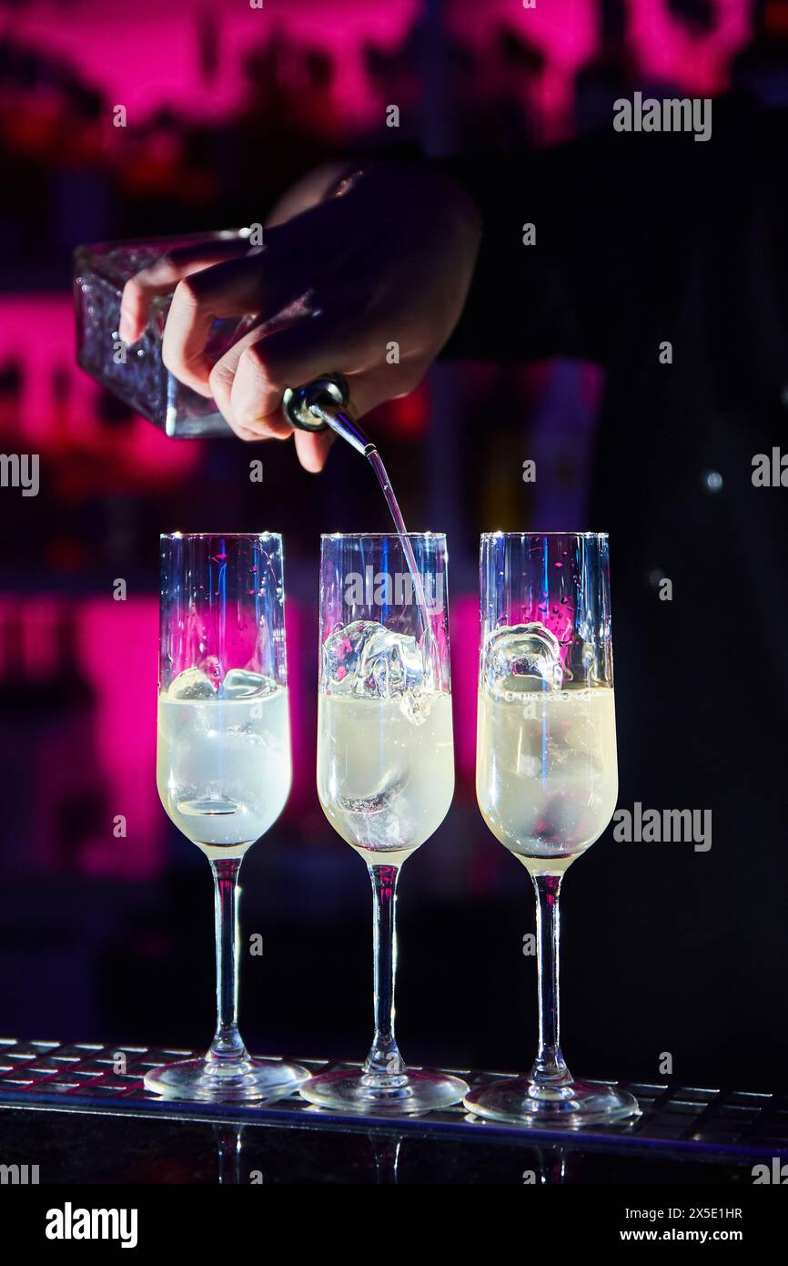 Bartender prepares alcoholic cocktail bar hi-res stock photography and ...