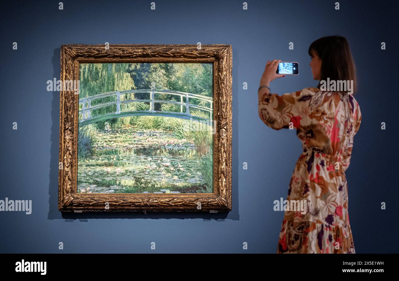 Dr Beatrice Bertram with Monet's 'The Water-Lily Pond' which will be ...