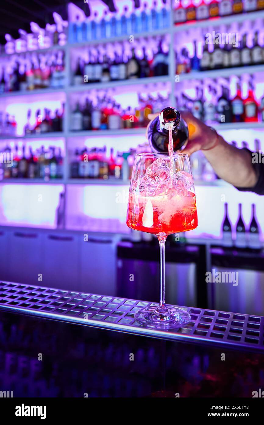Bartender prepares cocktail on bar hi-res stock photography and images ...