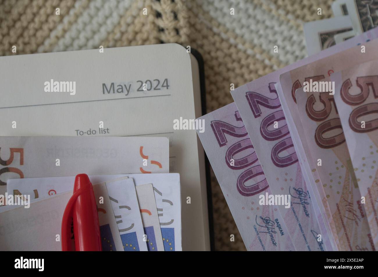 notebook with a blank sheet and paper money. economy concept Stock ...