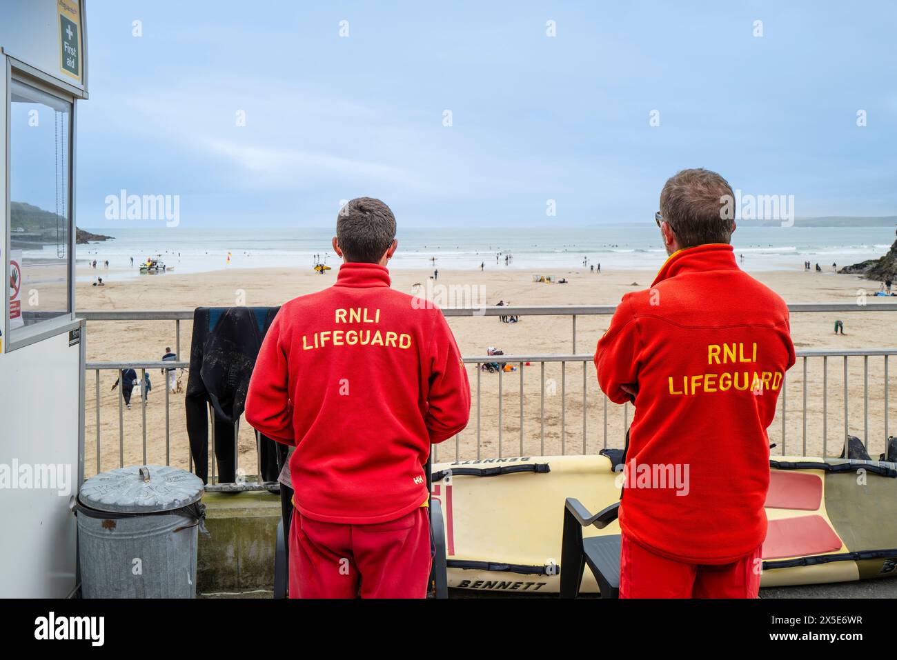 Two RNLI lifeguards on duty and watching over Towan beach in Newquay in ...