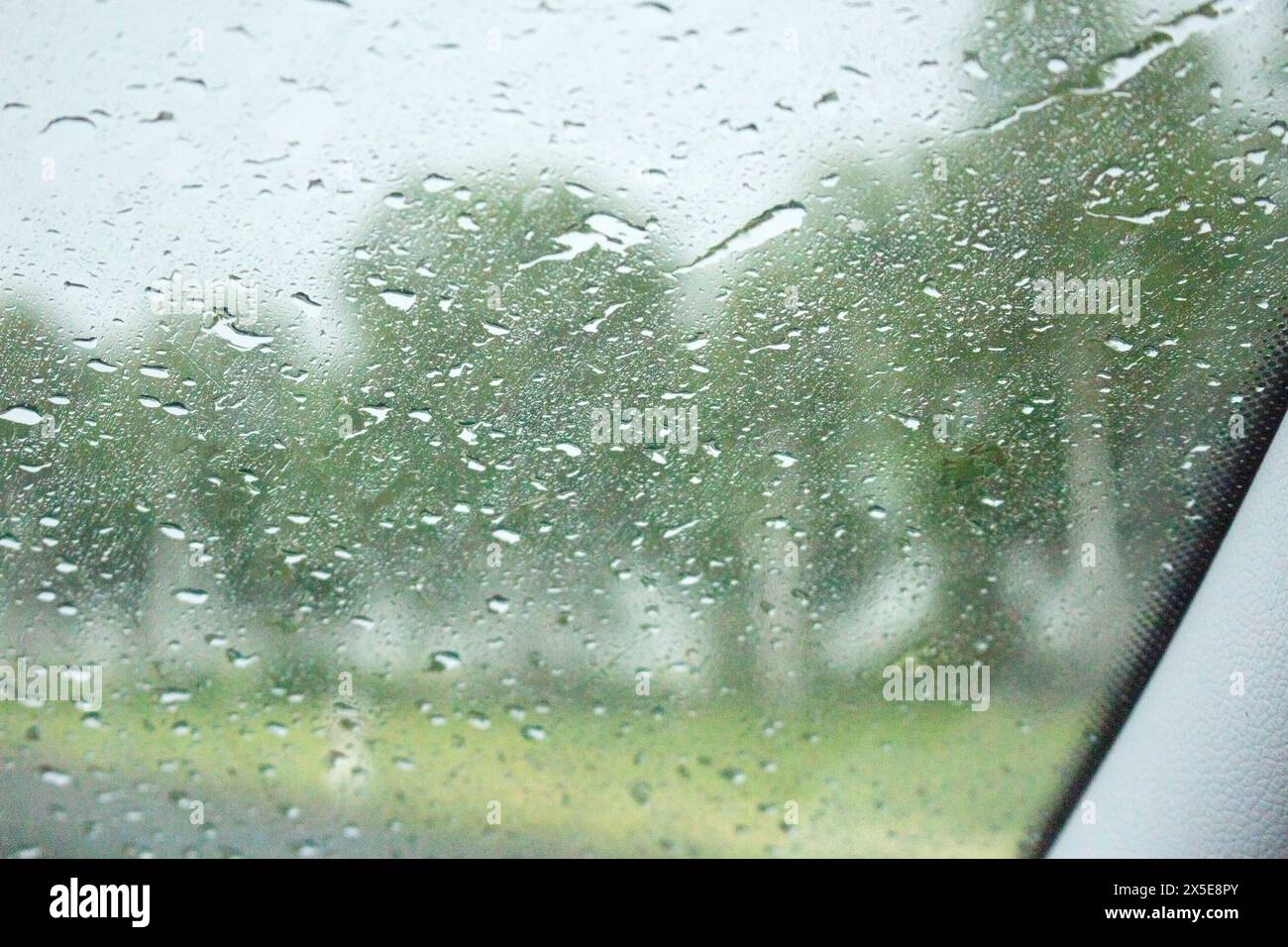 Shiny water droplets on a cold glass Stock Photo - Alamy