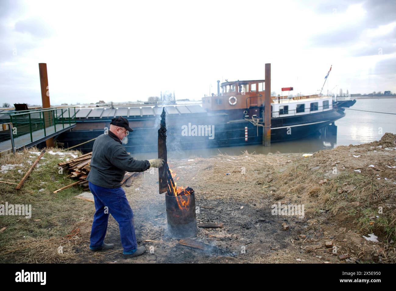 Barge Captain on Shore An Inland Barge s Owner and Captain buring scrap ...