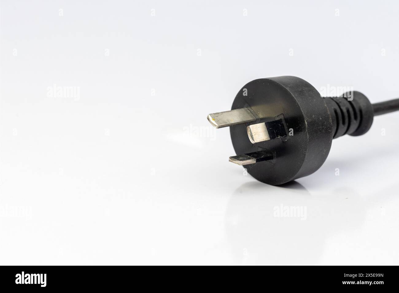 Electric plug with three pins isolated on a white background Stock ...