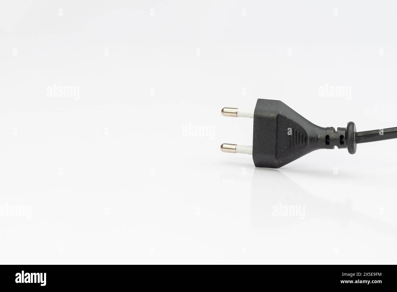 Black 2-pin electric plug isolated on white background Stock Photo - Alamy