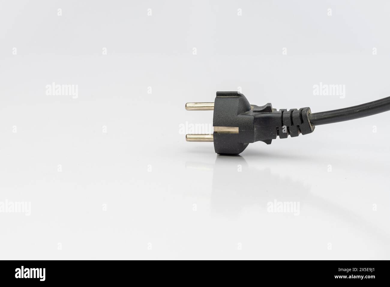 Power plug cord isolated on a white background Stock Photo - Alamy