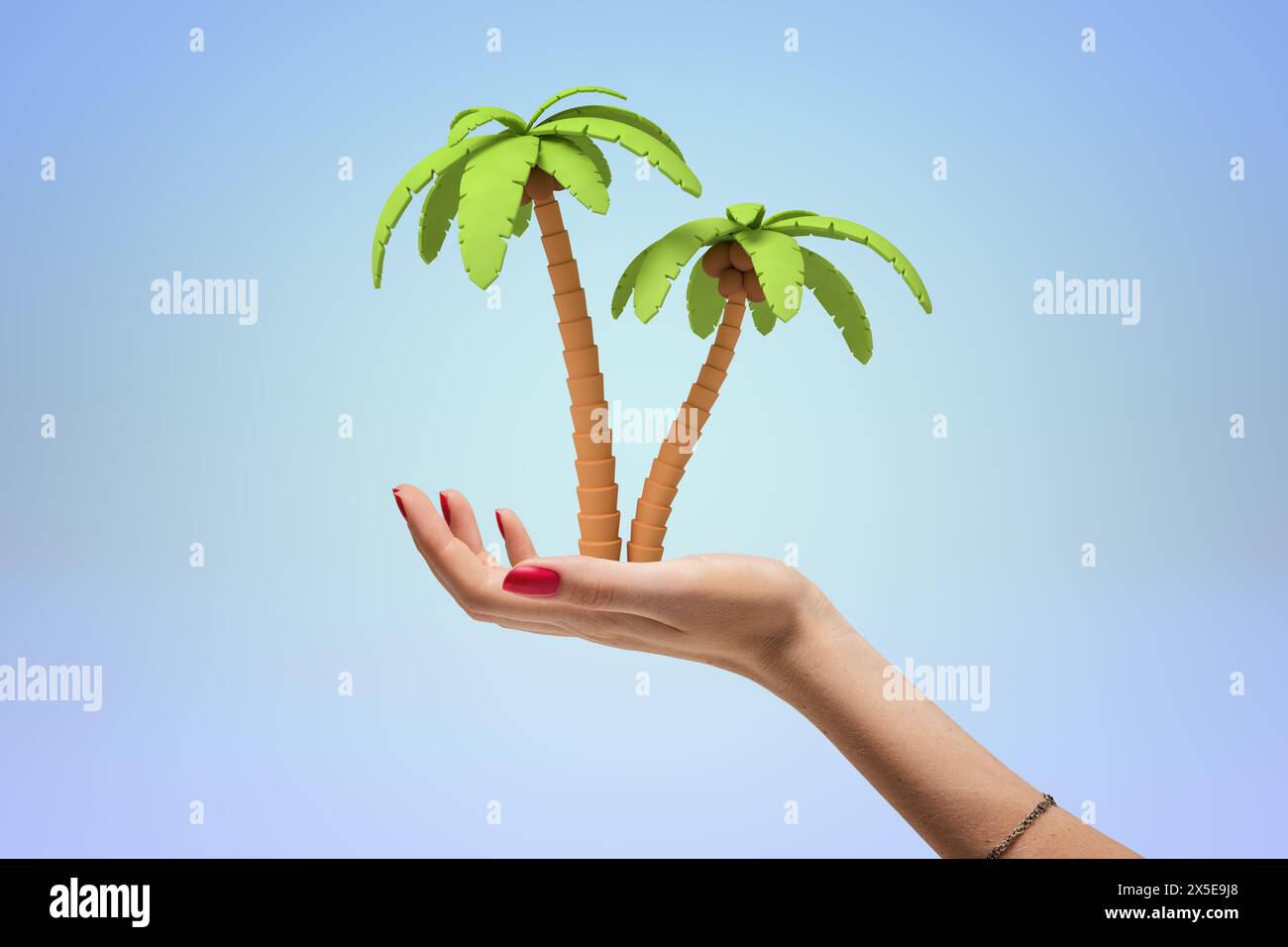 Palm Trees Balancing on a Hand Stock Photo - Alamy
