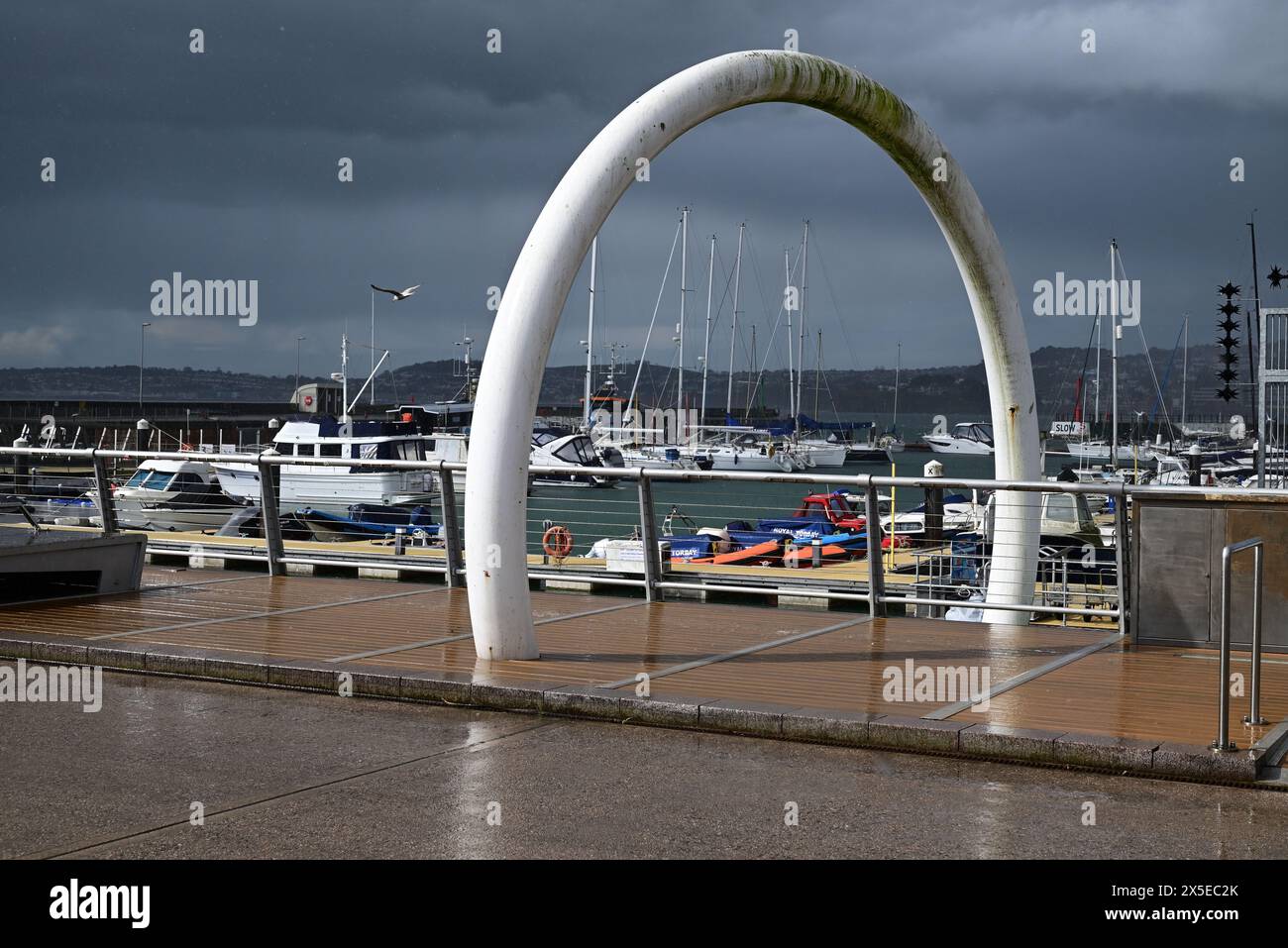 Dark rain clouds over the Vanishing Point Mooring Ring and Town Dock on ...