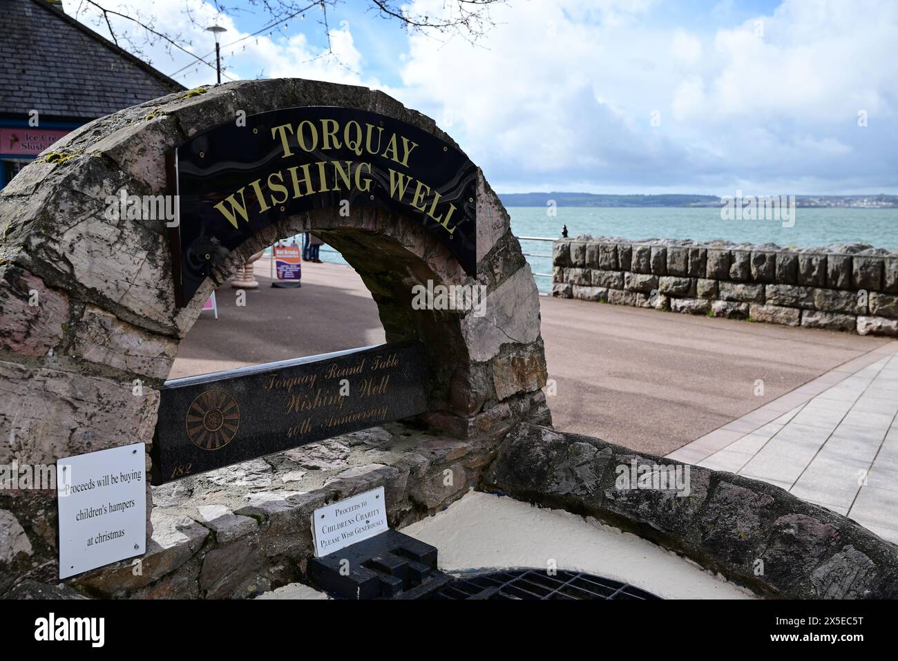 Wishing well on the seafront at Torquay, South Devon Stock Photo - Alamy
