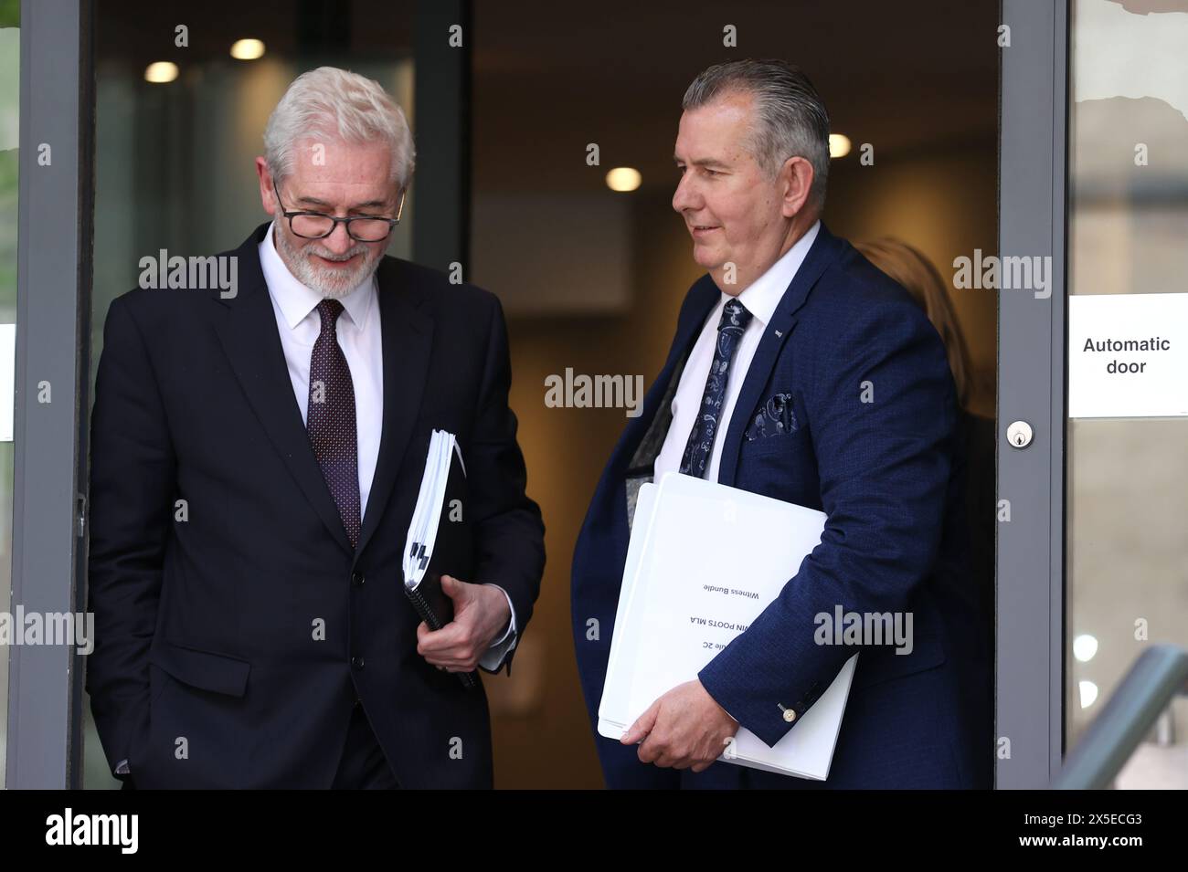 DUP MLA Edwin Poots (right) and solicitor John McBurney, leaving the ...