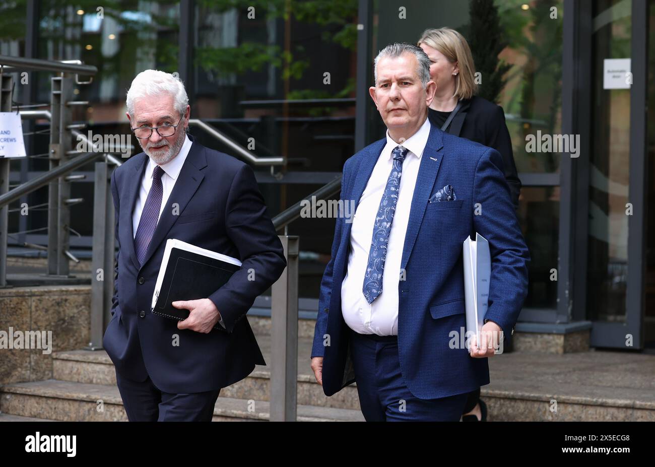 DUP MLA Edwin Poots (right) and solicitor John McBurney, leaving the ...