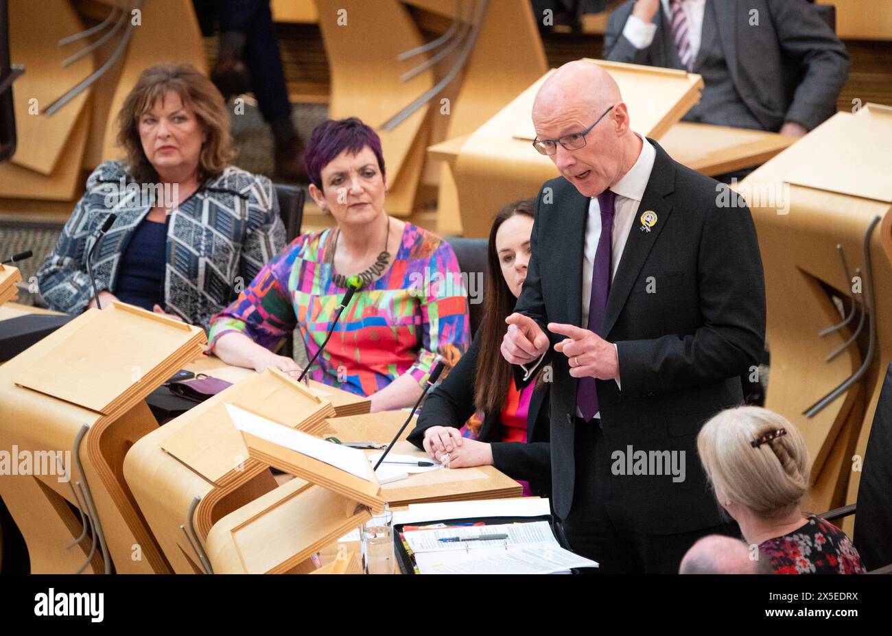 First Minister of Scotland John Swinney speaks during his debut at ...