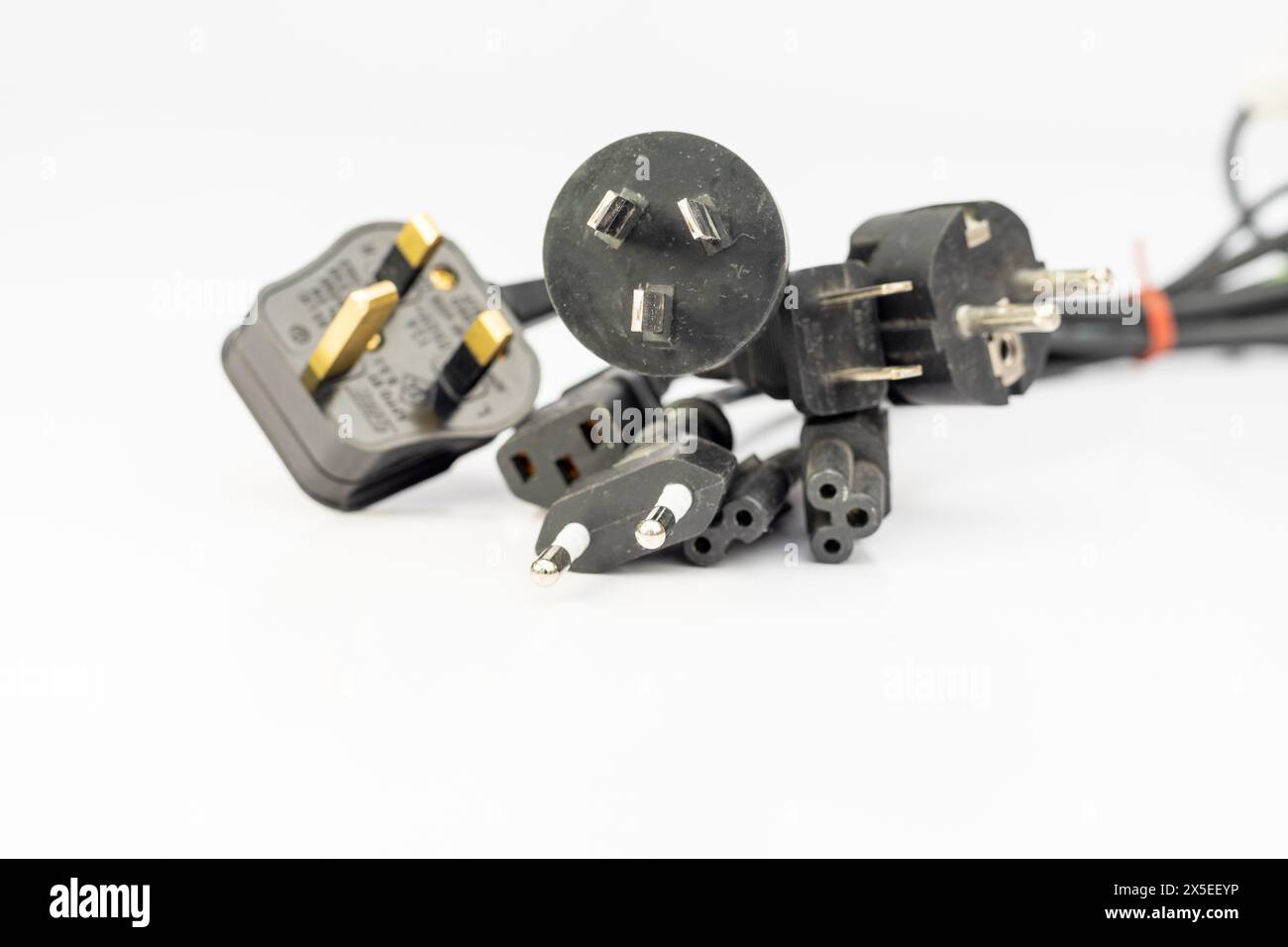 Different types of electric power plugs isolated on white background ...