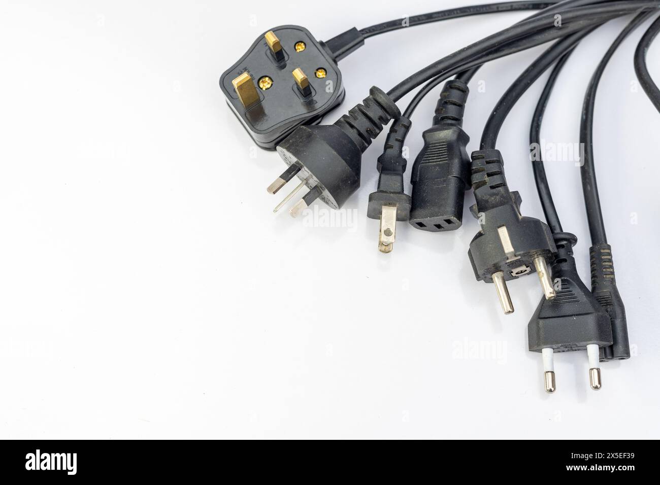 Several wires with different plugs on isolated white background Stock ...