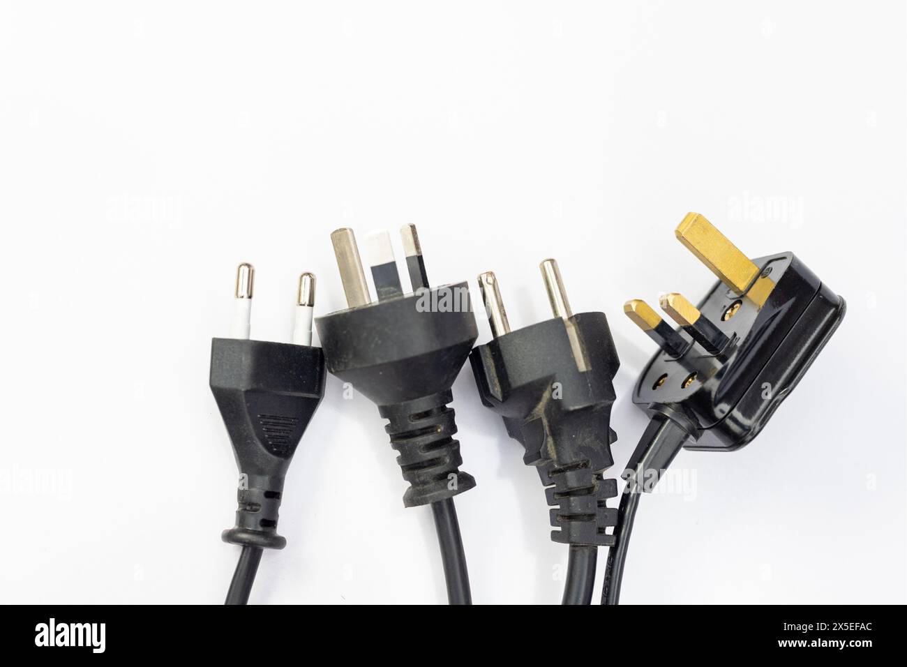 Closeup of a different electricity plugs isolated on white background ...