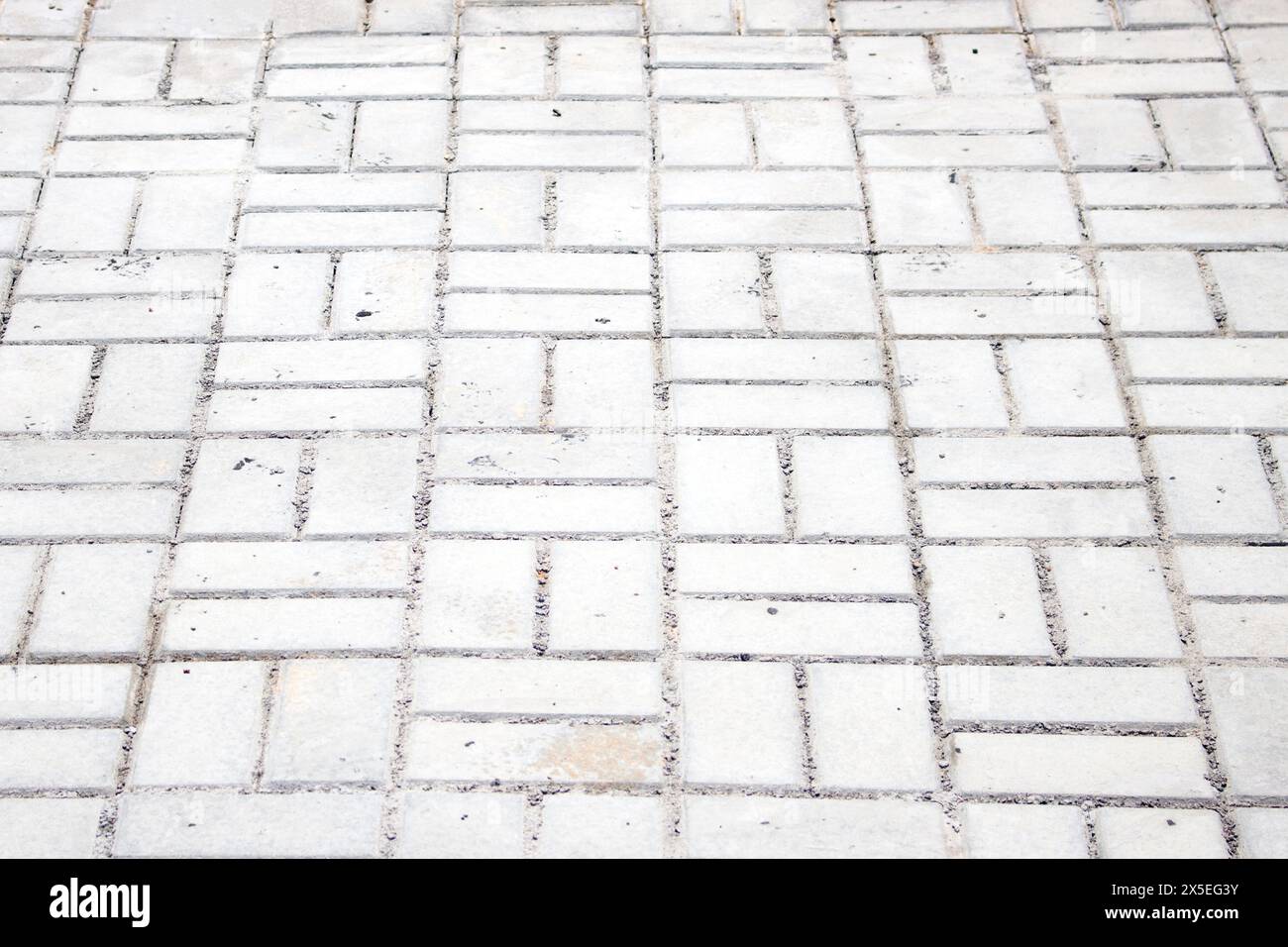 Textured rough path of concrete bricks Stock Photo - Alamy