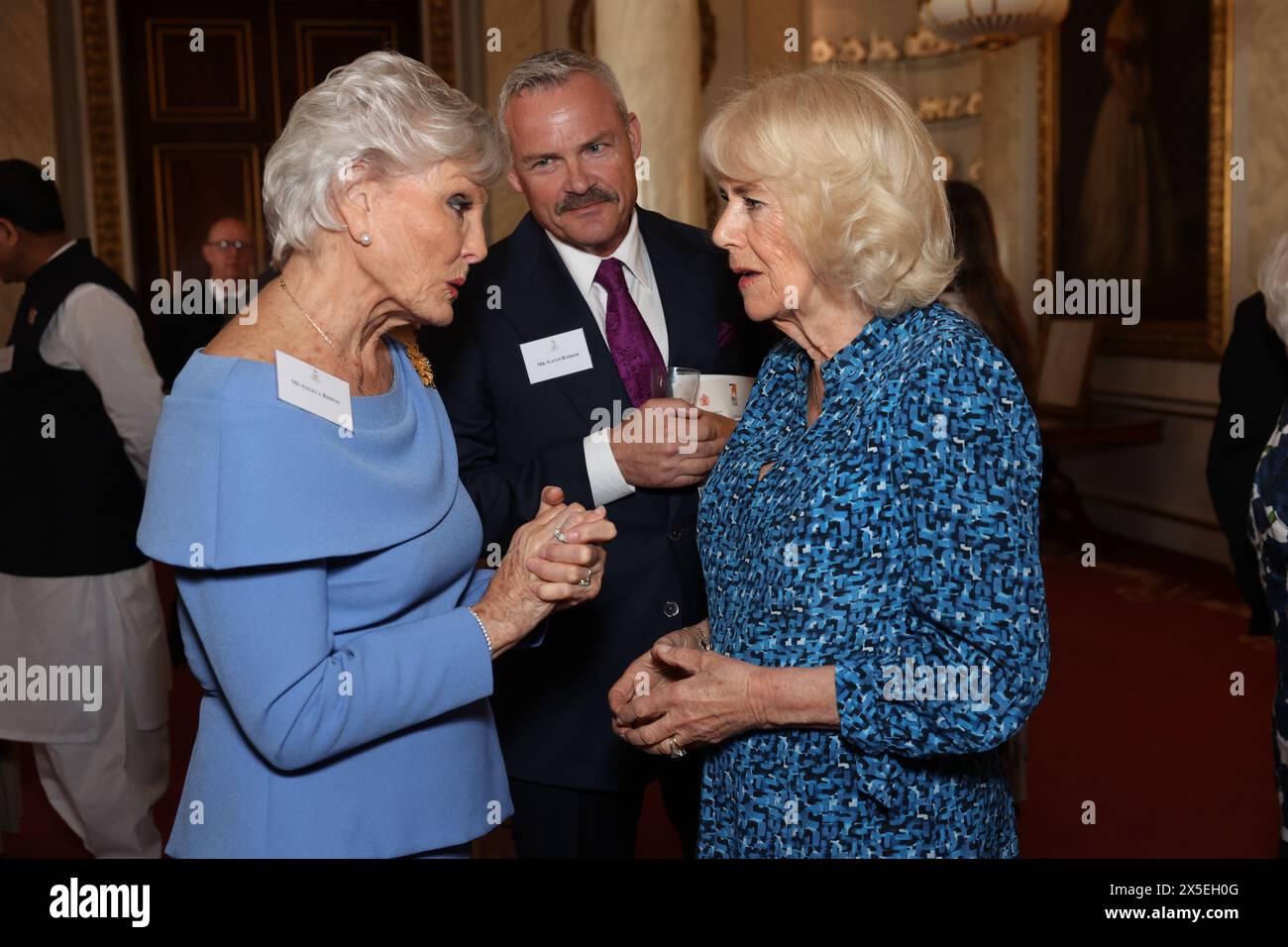 Queen Camilla speaks to Angela Rippon as she hosts a reception at ...