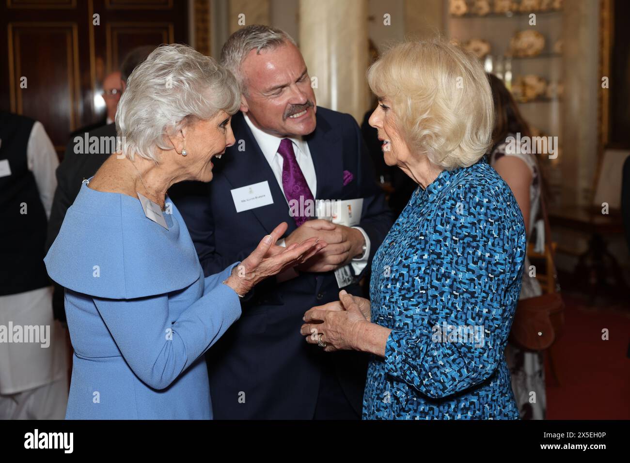 Queen Camilla speaks to Angela Rippon as she hosts a reception at ...