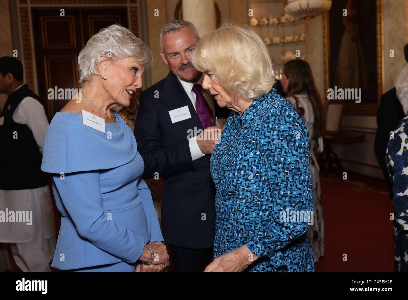 Queen Camilla speaks to Angela Rippon as she hosts a reception at ...