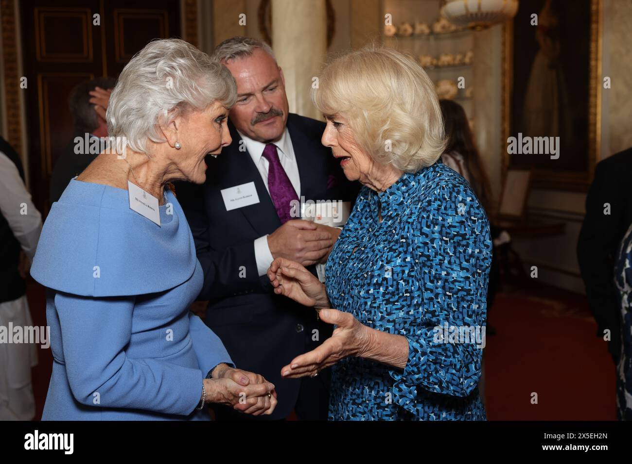 Queen Camilla speaks to Angela Rippon as she hosts a reception at ...