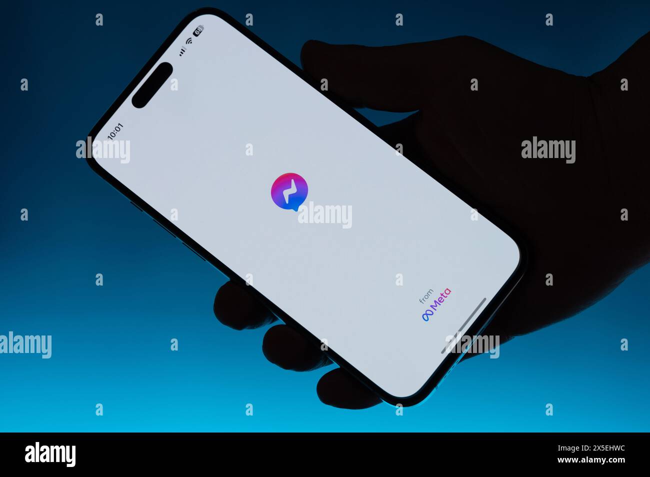 New York, USA - May 6, 2024: Open messenger app on smartphone in hand ...