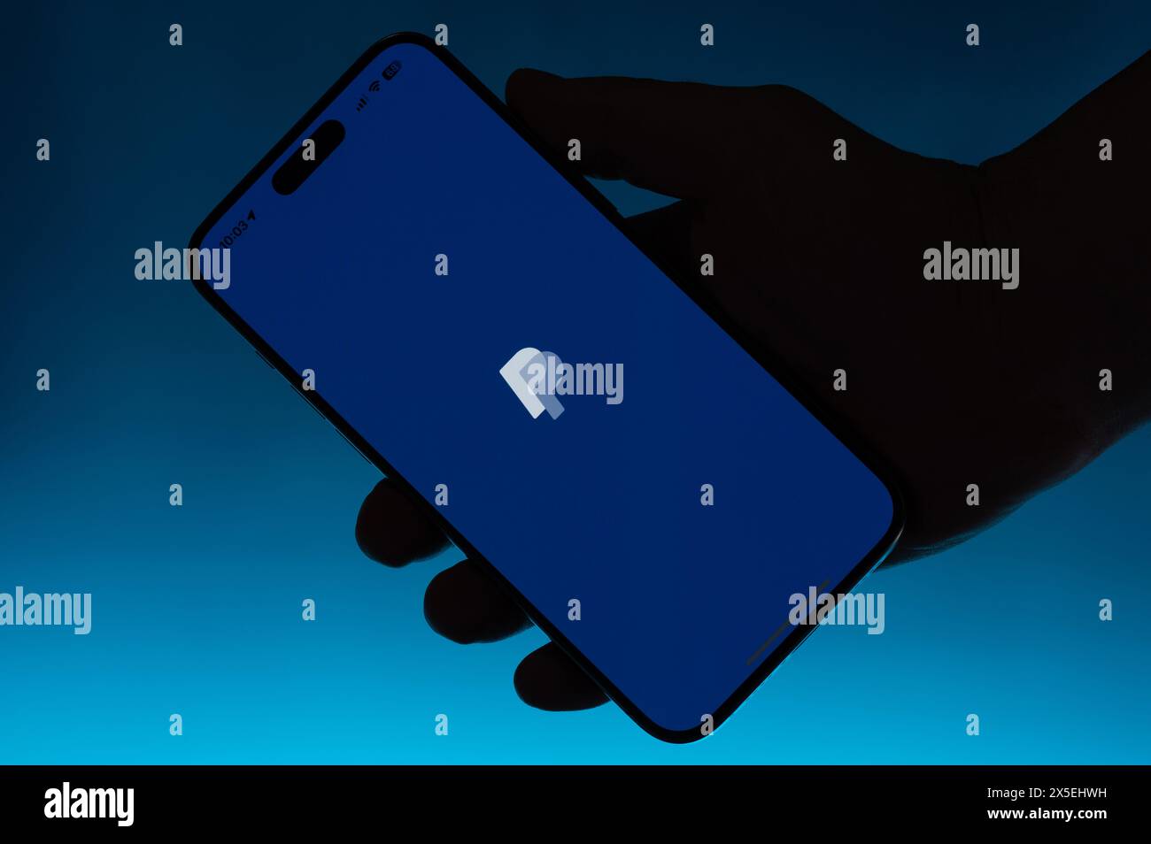 New York, USA - May 6, 2024: Open Paypal app on smartphone in hand ...