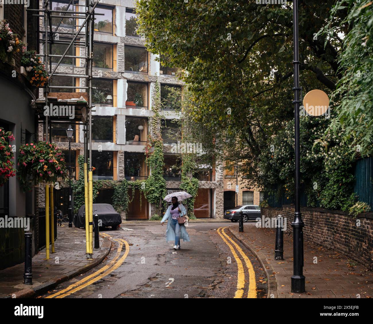 View of frame cladding with square windows in context with surrounding ...