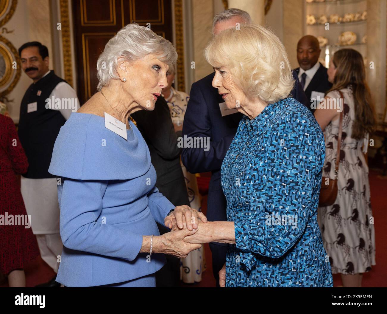Queen Camilla speaks to Angela Rippon as she hosts a reception at ...