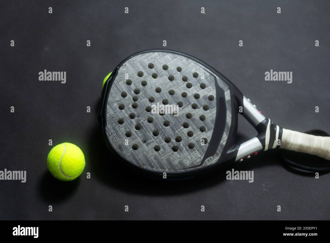 Isolated paddle tennis objects black background Stock Photo - Alamy