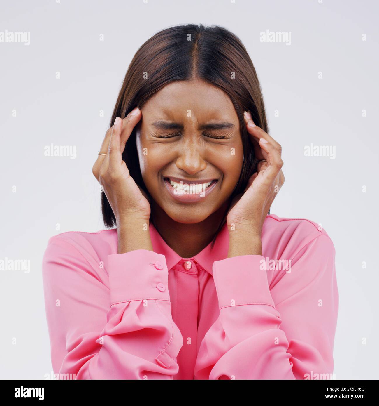 Indian woman, hands and headache pain in studio with stress pressure ...