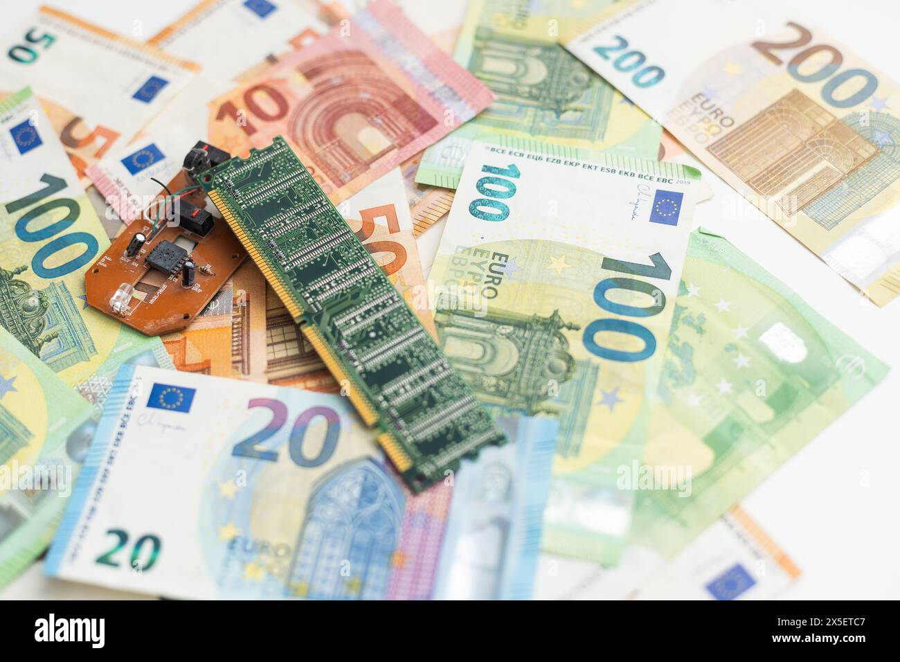 5 euro banknotes next to the micro-schemes. Top view Stock Photo - Alamy