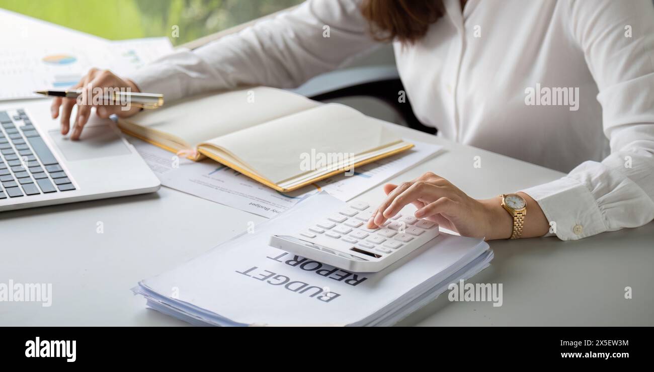 Interest rate and dividend concept businesspeople is calculating income ...