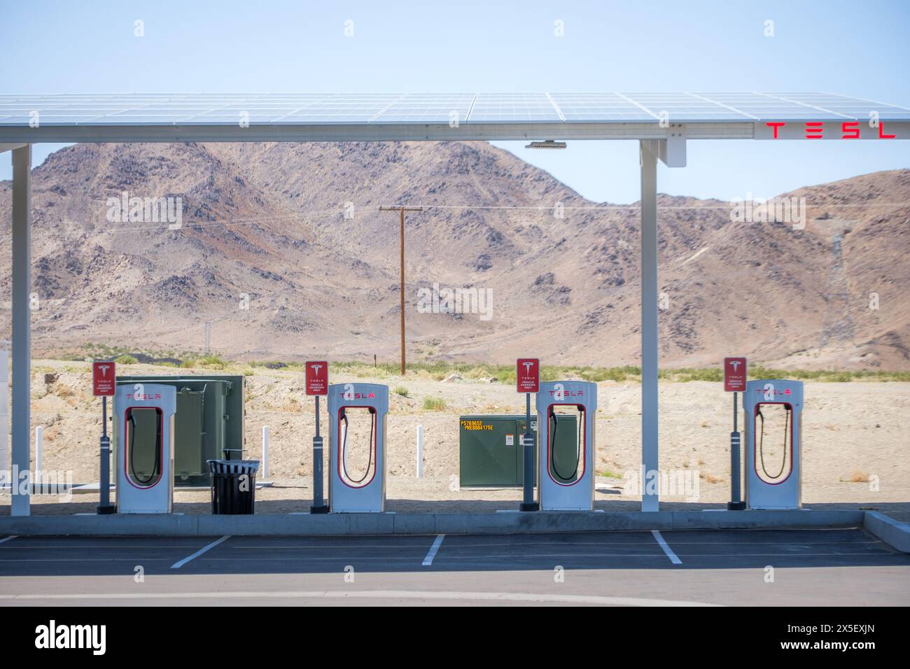 A large collection of Tesla Superchargers in action along Interstate 15 ...