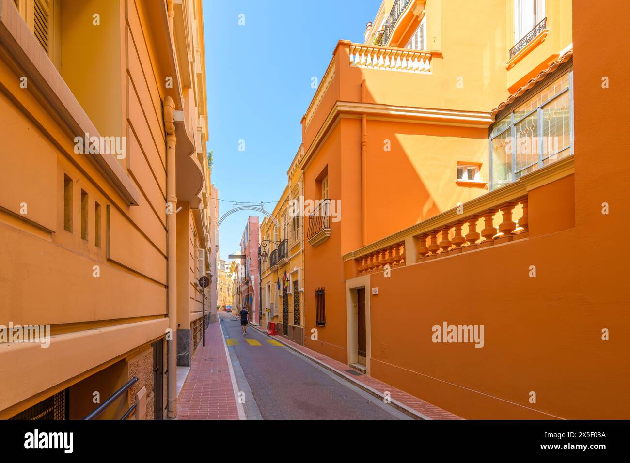 A narrow, colorful alley street in the colorful old town medieval ...