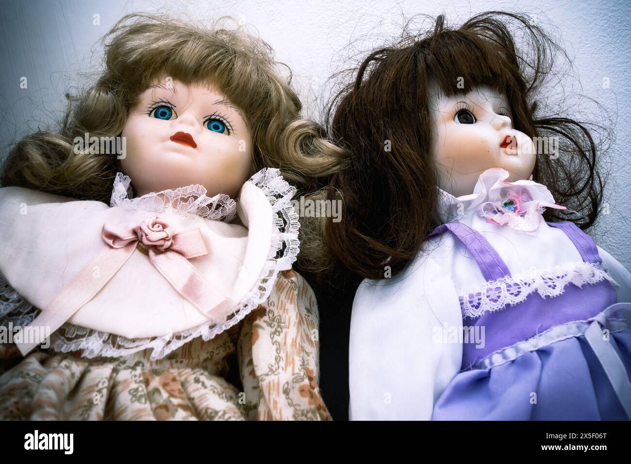Mysterious looking horror toy dolls in a moody tone Stock Photo - Alamy